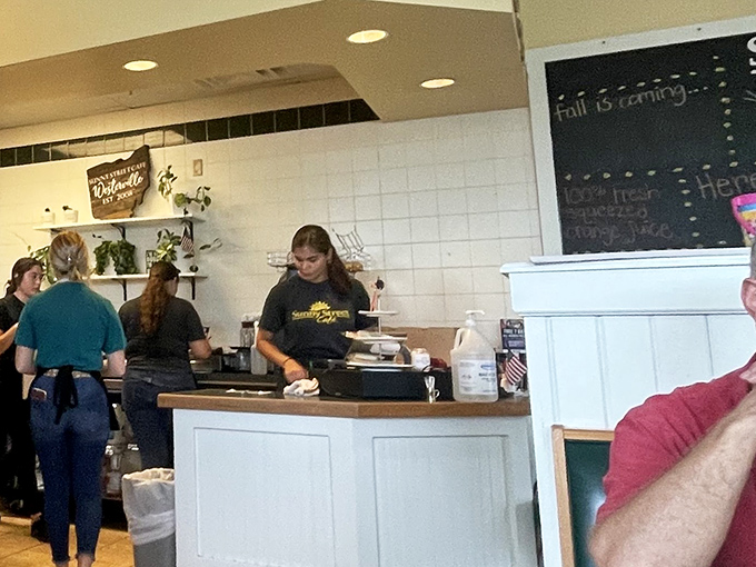 The real heroes wear aprons, not capes—dedicated staff keeping the coffee flowing and the pancakes perfectly golden.