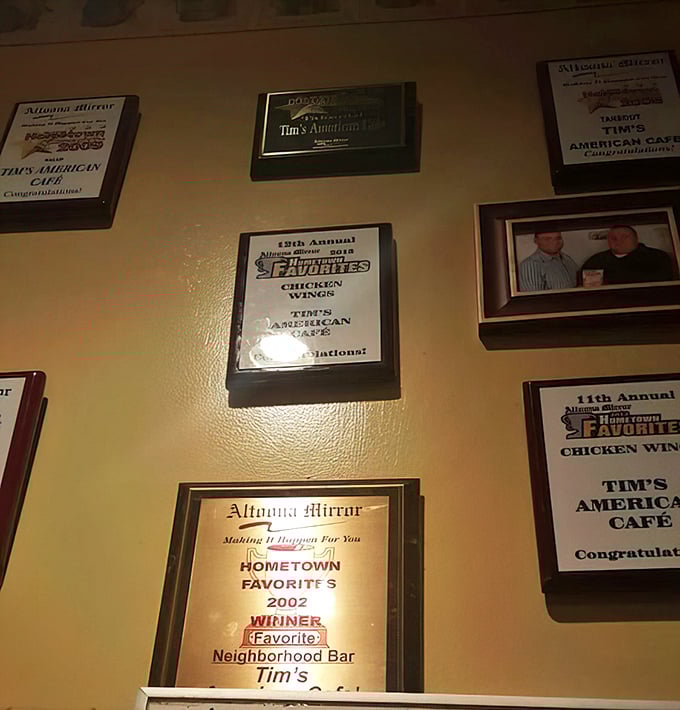 Wall of fame! These awards aren't just decoration – they're the community's way of saying "these wings and neighborhood vibes are officially spectacular."