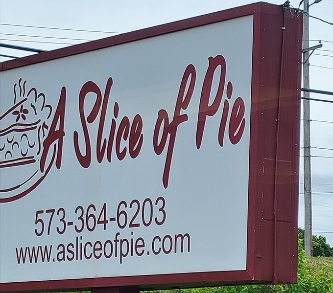 The sign offers more than just contact information – it's your invitation to pie paradise. That phone number might be the most important set of digits you'll ever save.