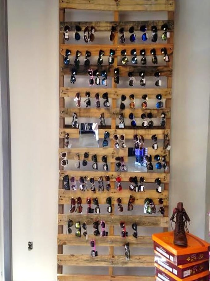 Sunglasses paradise built from a wooden pallet. Genius display for eyewear that lets you channel your inner celebrity without their bank account.