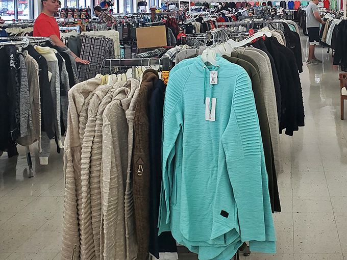 That mint-colored sweater still has its tags—the holy grail of thrifting. Someone's impulse buy becomes your calculated victory.