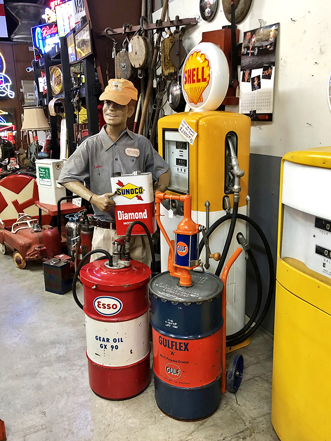 The vintage gas station display – when service attendants wore uniforms and "fill 'er up" meant more than just pushing a button.