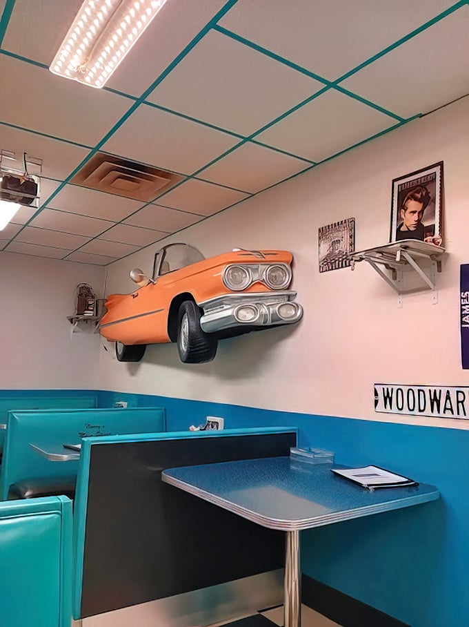 That orange Chevy on the wall isn't just decoration—it's a reminder that American classics never go out of style, whether cars or comfort food.