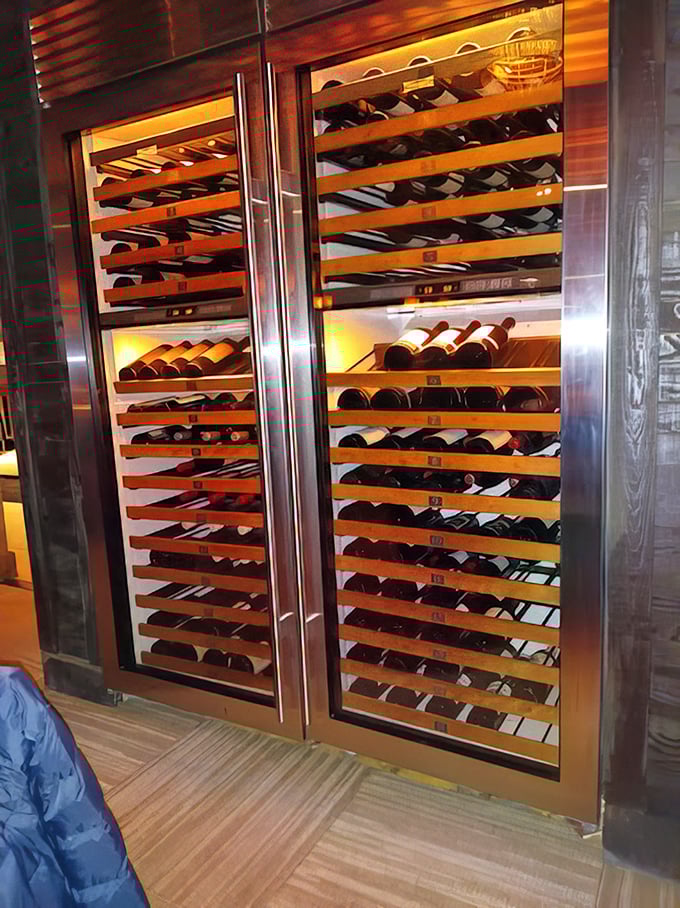 This wine display isn't just storage—it's a temperature-controlled temple to fermented grapes that would make any oenophile weak in the knees.