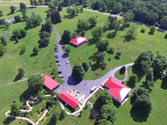 A bird's eye view of this natural wonder's surface facilities. The red roofs mark the spot where adventure begins beneath rolling Ohio countryside.