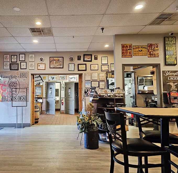 Awards and accolades line the walls – silent testimonials to years of barbecue excellence. Each certificate represents countless hours of smoking, tasting, and perfecting.