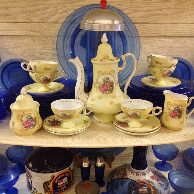 This exquisite tea service tells stories of refined gatherings. Delicate courtship scenes painted on creamy porcelain transport you to gentler times. 