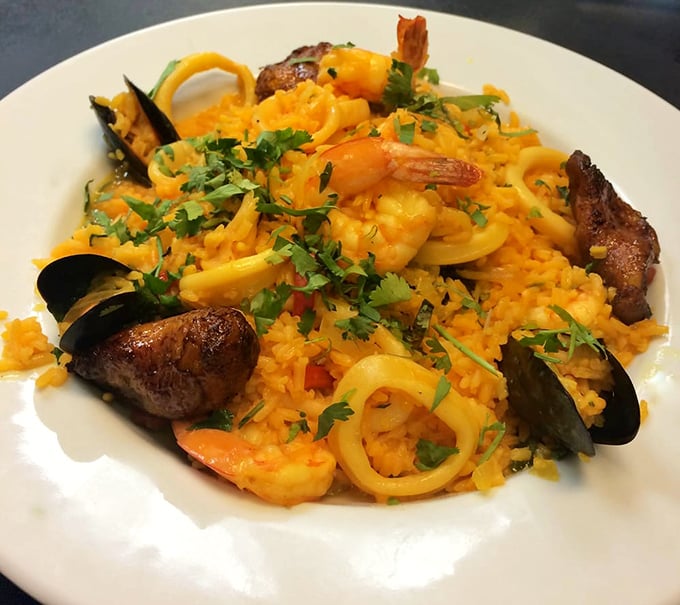 This seafood paella isn't just dinner—it's a treasure hunt. Each forkful reveals new delights from land and sea nestled in saffron-kissed rice.