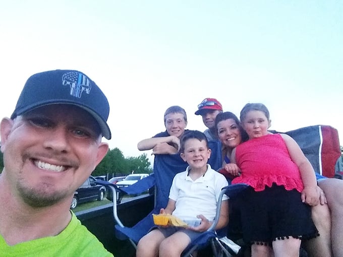 Family movie night takes on new meaning when you're watching from your own vehicle. These smiles say everything about the drive-in experience.