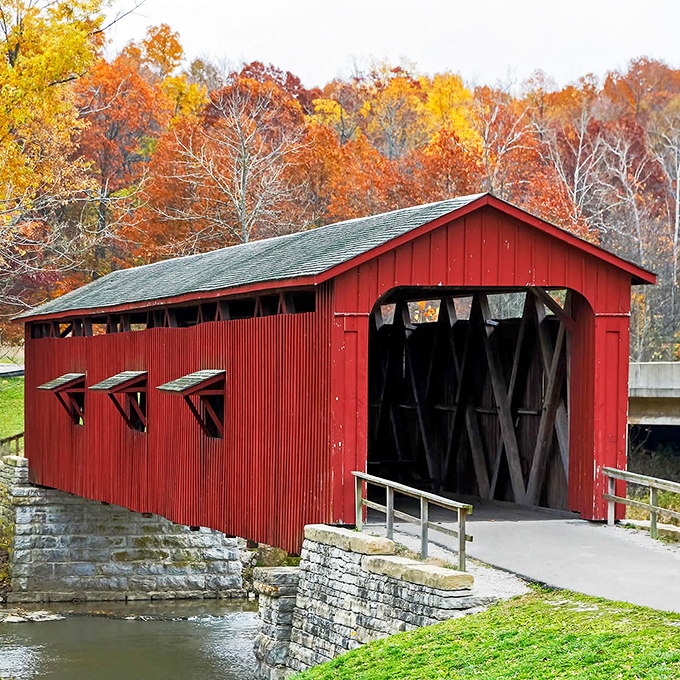 Fall foliage creates the perfect backdrop, as if Mother Nature herself decided to dress up for the bridge's photo op.