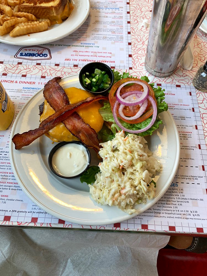 This isn't just a burger—it's architecture, engineering, and art all stacked between two buns with bacon as the exclamation point.