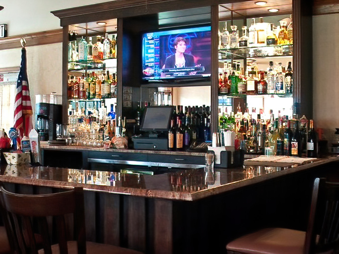 A fully-stocked bar that says "yes, you can have a Bloody Mary with your breakfast." Sophisticated evening vibes in a place that also serves scrapple.