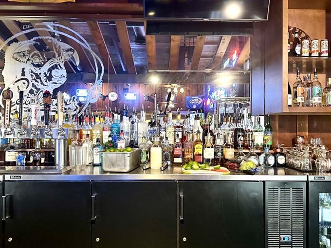This isn't just a bar back wall—it's a library of spirits where bourbon and whiskey stand at attention, ready to complement your carnivorous experience.
