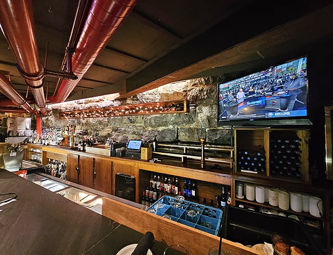This isn't just a bar—it's command central for libations, with exposed stone walls that have witnessed generations of toasts and celebrations.