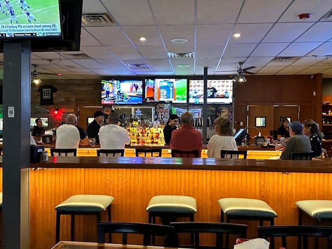 The bar area buzzes with the energy of regulars who've found their happy place, where bartenders remember your name and your usual order.