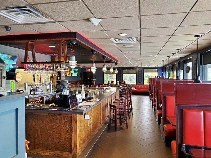 The bar area offers a cozy spot where solo diners feel welcomed and couples can enjoy intimate conversations.