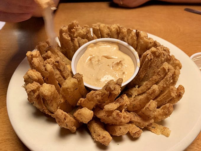 The Cactus Blossom blooms with golden-fried perfection. That dipping sauce in the center is the treasure at the end of the crispy rainbow.