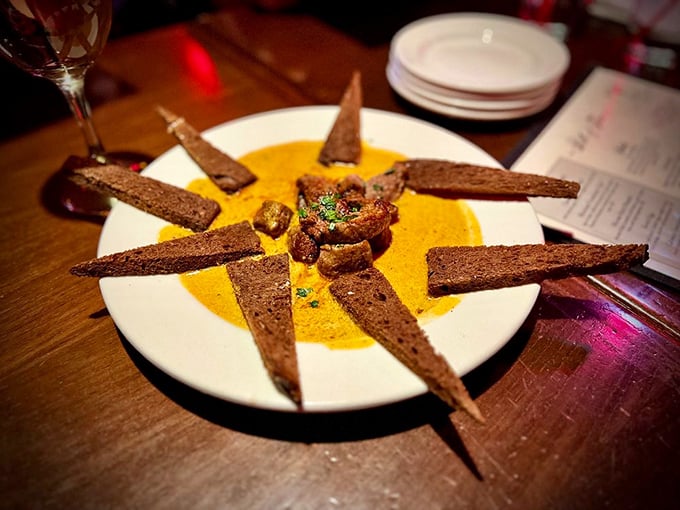 Whoever said "steak should be boring" never met these boldly spiced strips posing dramatically on their sunset-colored canvas of sauce.