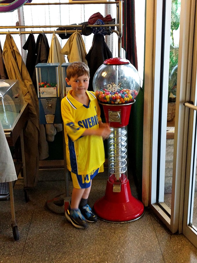 A gumball machine standing sentinel by the door—the final, colorful temptation for kids who've already negotiated ice cream after their meal.
