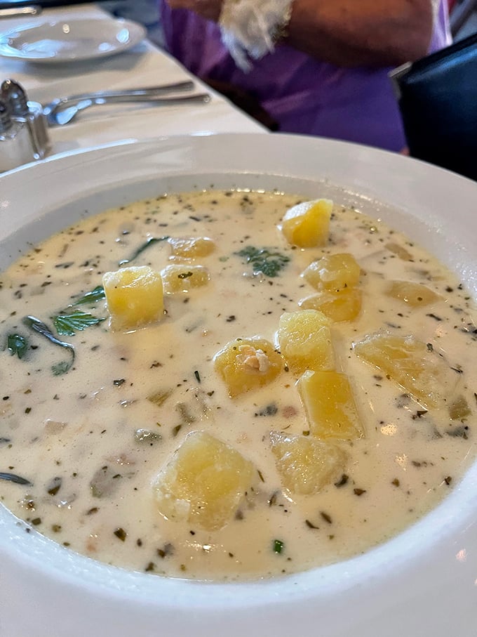 This isn't just clam chowder—it's a creamy ocean hug in a bowl, studded with tender potatoes and herbs that transport you straight to the coastline.