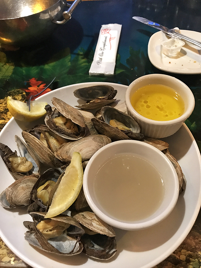 These steamers aren't just clams—they're briny little time machines transporting you straight to a Cape Cod summer afternoon.