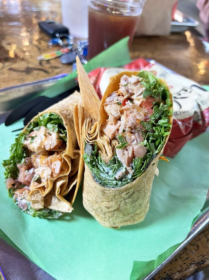 These wraps don't just contain ingredients; they showcase them—fresh greens embracing perfectly seasoned meat in a handheld flavor festival.