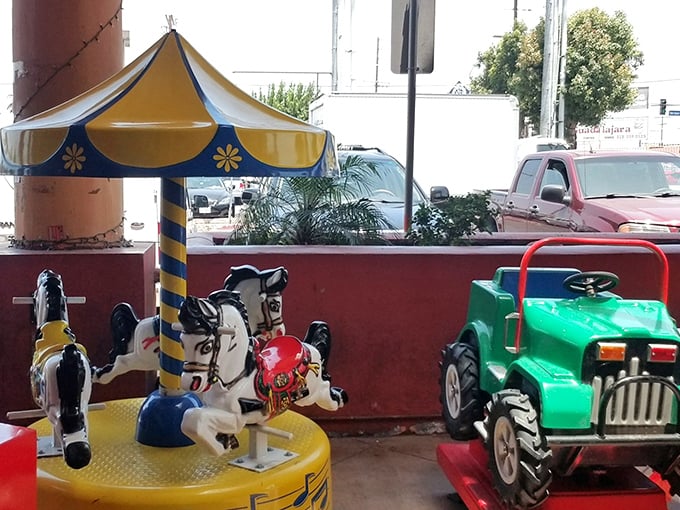 These coin-operated rides are time machines disguised as children's entertainment, transporting parents back to their own quarters-in-hand youth.