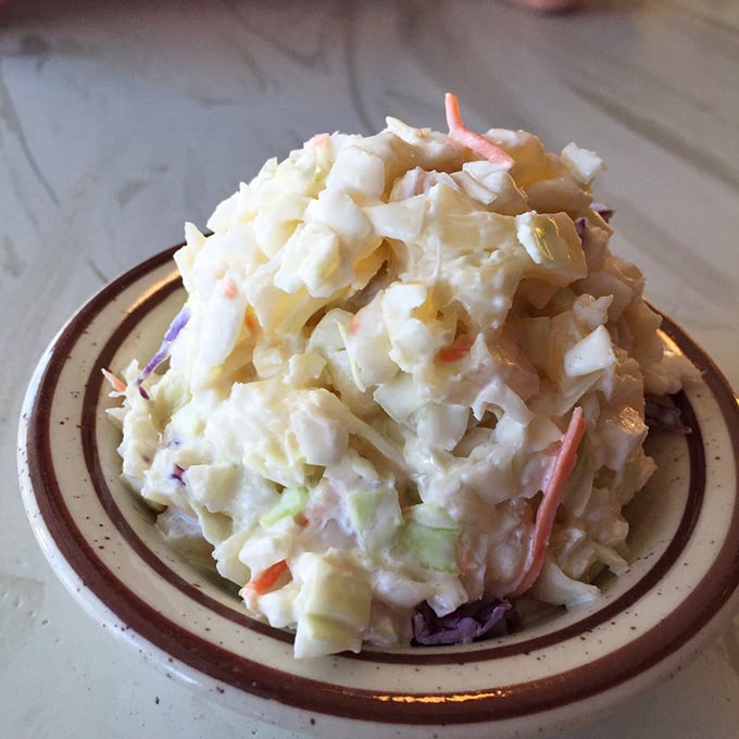 Coleslaw that actually deserves respect. Not an afterthought, but a creamy, crunchy side that holds its own against the chicken superstar.