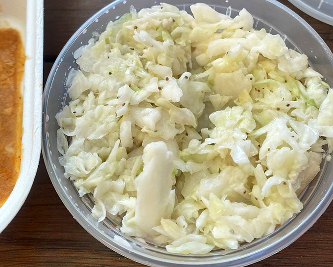Coleslaw that knows its role—to cut through richness and refresh your palate for the next meaty bite.