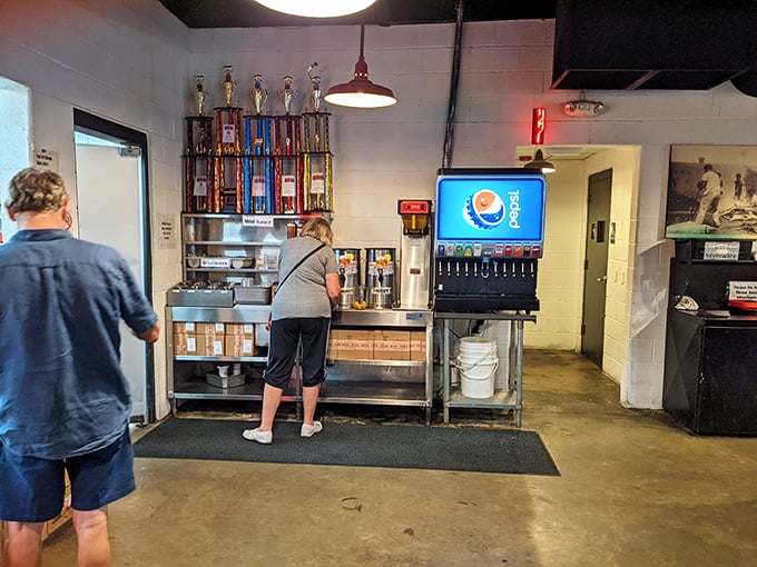 Sweet tea and soda machines stand ready for duty—because fighting barbecue thirst requires serious reinforcements.