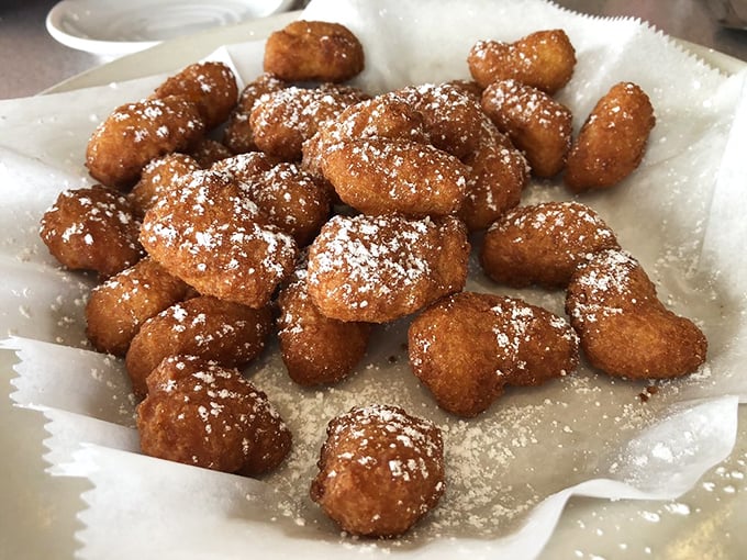These golden corn nuggets dusted with powdered sugar blur the line between appetizer and dessert in the most delightful way possible.