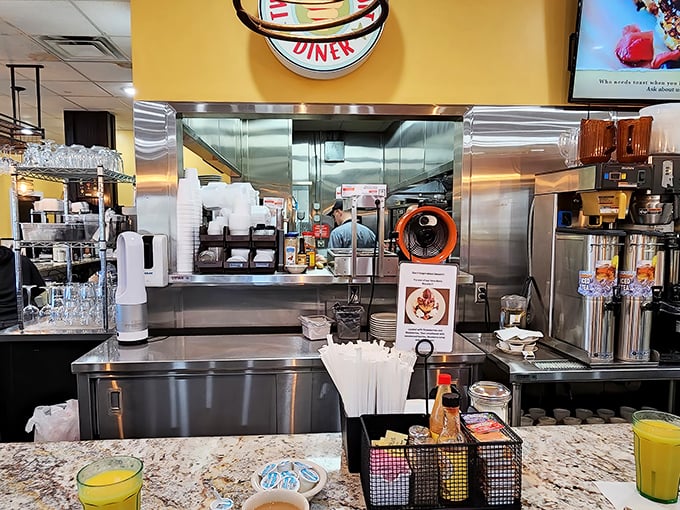 The beating heart of biscuit operations—a counter where breakfast dreams come true and coffee cups never stay empty for long.