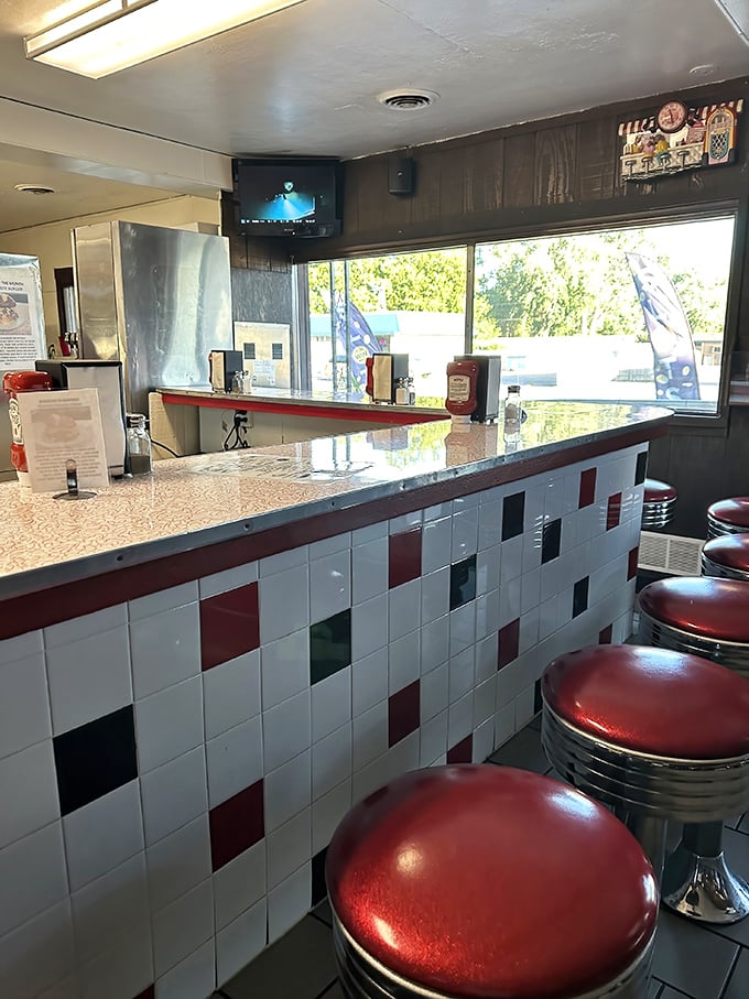 The counter seats – where solo diners find community and the best view of short-order cooking choreography in action.