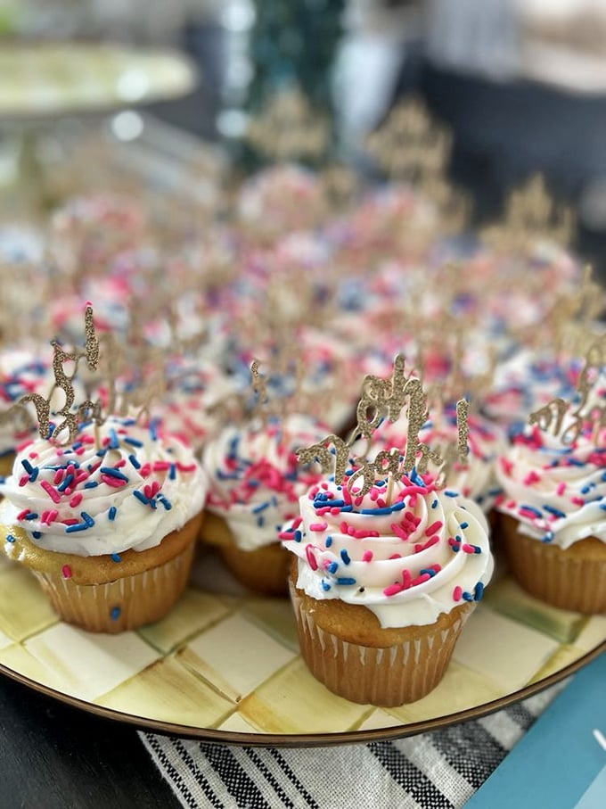 These patriotic cupcakes aren't just desserts—they're tiny celebrations topped with sprinkles and golden birthday wishes.