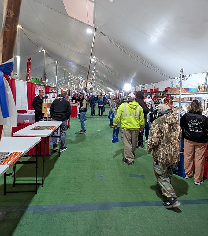 The green carpet treatment leads shoppers through a tent city of treasures—a retail adventure under canvas roofs.