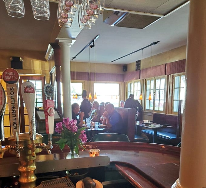 The dining room hums with the universal language of people enjoying food too good to rush through.