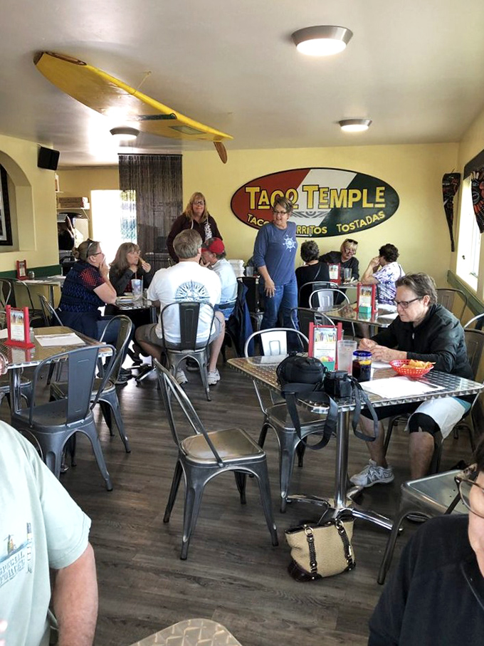 The dining room buzzes with the energy of happy eaters. Notice how nobody's looking at their phones—the food commands full attention.