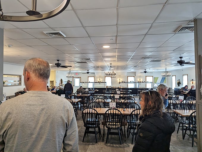 A dining room filled with the pleasant hum of satisfied customers. Notice the lack of phones—people are too busy enjoying their food.