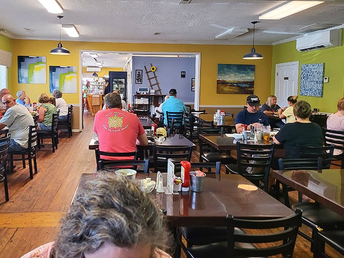 Bright yellow walls and wooden floors create the perfect canvas for morning conversations and coffee refills.