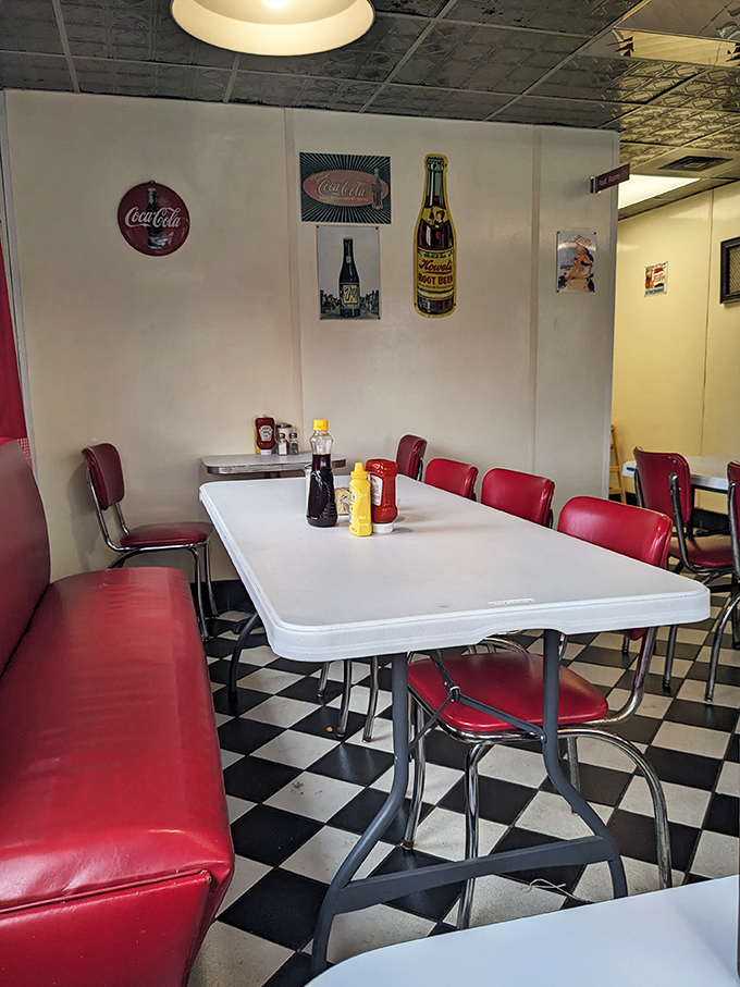 Simple tables, classic condiments, and red vinyl chairs – the stage is set for food that doesn't need fancy surroundings to shine.