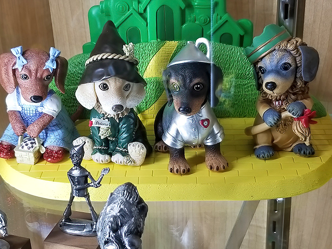 Dorothy and friends reimagined as dachshunds—because apparently regular collectibles weren't cute enough to separate fans from their souvenir budget. 