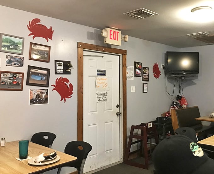 Even the exit door gets the crab treatment – a reminder that you're in seafood territory from the moment you enter until your last goodbye.