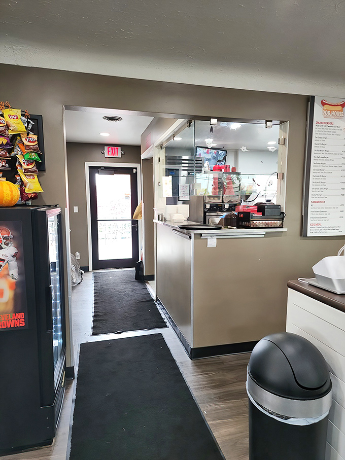 The path to hot dog nirvana is clearly marked. This hallway leads to where the magic happens—a kitchen that understands the profound importance of proper condiment distribution.