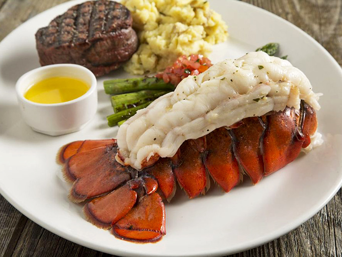 The surf and turf that launched a thousand diet resets. That lobster tail isn't just food—it's a celebration wearing butter as formal attire.