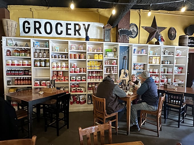 The "GROCERY" sign remains, but these shelves stock something better than ingredients – they hold the finished masterpieces.