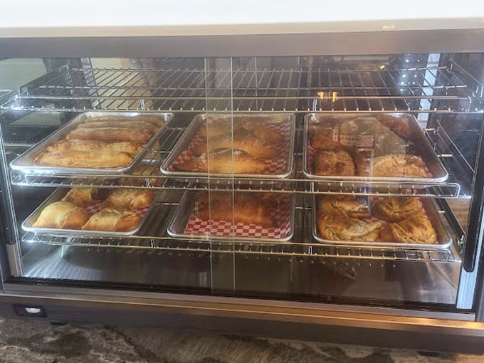 Freshly baked treasures await behind glass, like a museum exhibit you're actually encouraged to touch—and devour.