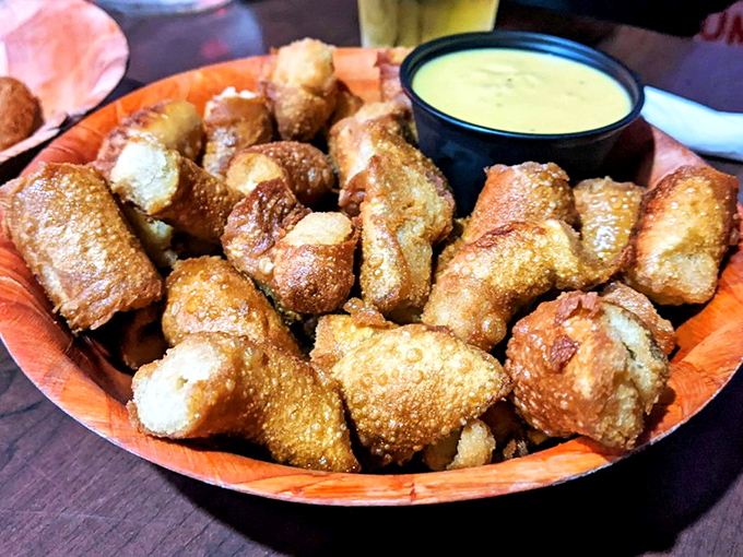Pretzel bites that have achieved the perfect golden crunch. Paired with a creamy dip, they're the opening act that somehow manages to steal part of the show.