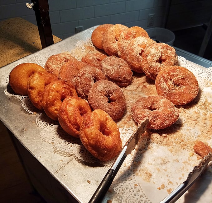 These homemade donuts aren't just fried dough—they're warm, sugary time machines that transport you straight back to childhood boardwalk memories.