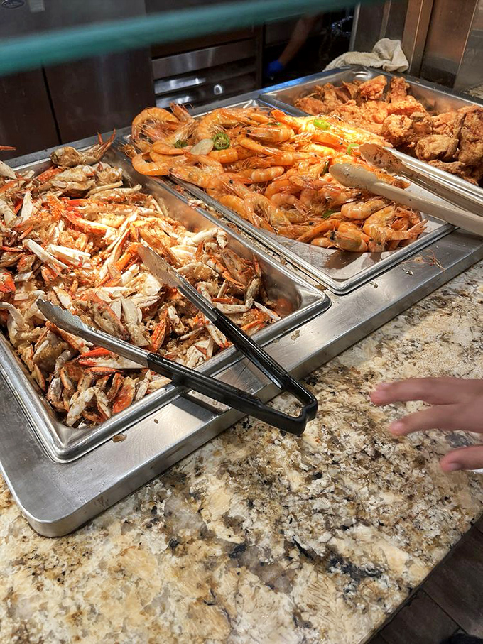 The seafood station showcases crab legs and shrimp – oceanic treasures that make you feel like you've struck gold without the inconvenience of actual mining.