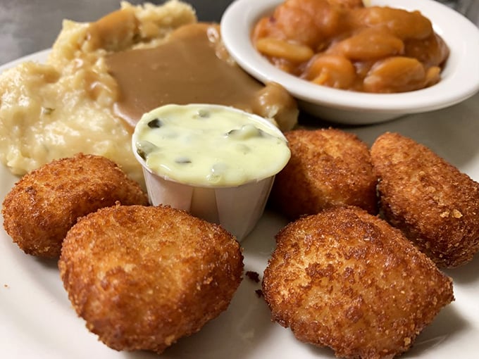These golden-fried beauties aren't just croquettes—they're edible time machines. One bite and you're transported to a simpler time when calories weren't counted, just enjoyed.
